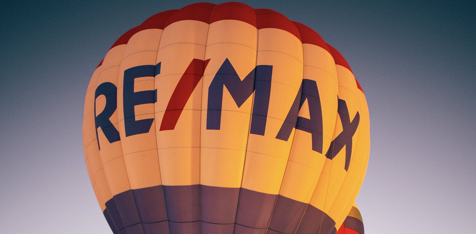 One Year at eXp Reminded This Top Producer of the RE/MAX Competitive Edge